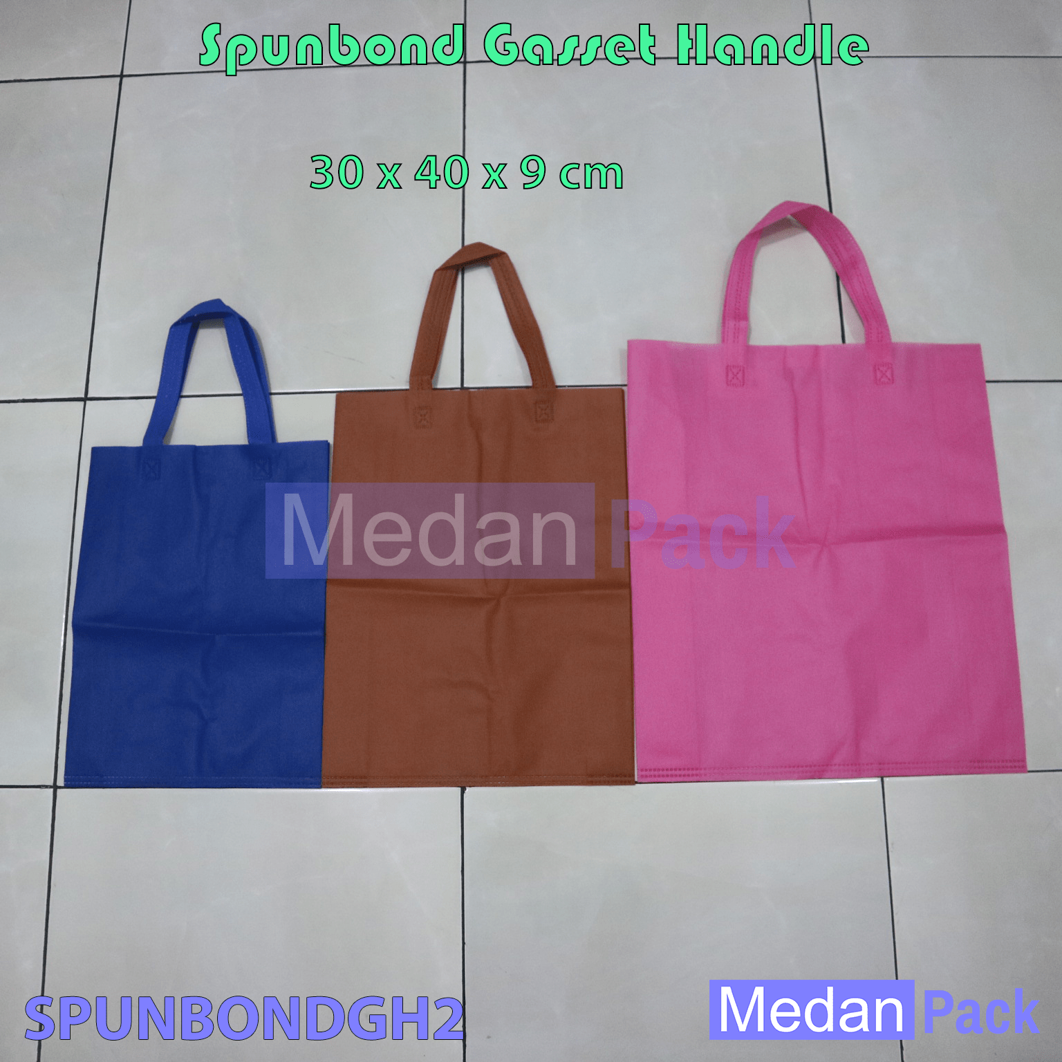 Tas Spunbond Kain Souvenir Gasset Handle uk. 30 x 40 x 9 cm | Medan Pack